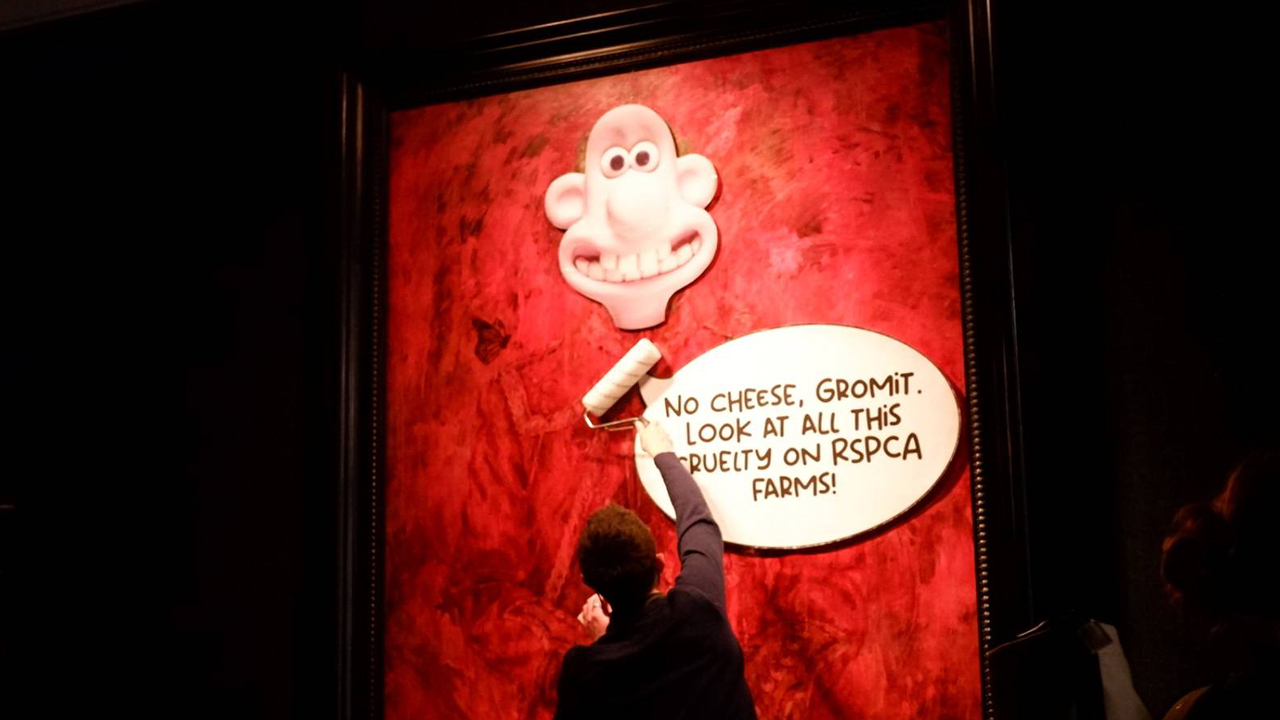 King Charles III portrait defaced with Wallace and Gromit posters ...